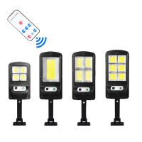 China 100w 200w 300W Modern LED Garden Outdoor Solar Wall Light With Motion Sensor Remote Control for sale