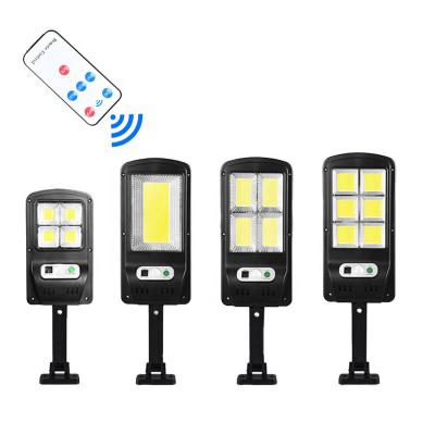 China 100w 200w 300W Modern LED Garden Outdoor Solar Wall Light With Motion Sensor Remote Control for sale