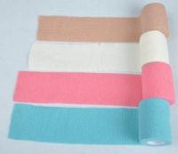 China 4.5-5m Medical Surgical Bandages Red Medical Use Adhesive Elastic Bandage for sale