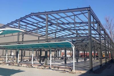 China Customized Steel Structure Workshop Prefab Building with Sandwich Panel Door 100 sqm for sale