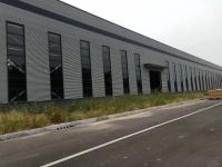 China Robust Prefab Steel Warehouse With Rolling Door for sale