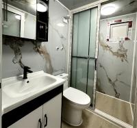 China 20-foot ivory white expanded container house with bathroom for sale