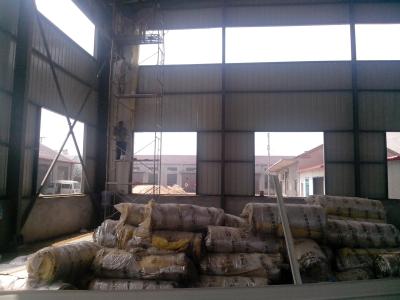 China Water Resistant Fabricated Steel Structure Godown Q345 Metal Carport Garage 20m Span for sale