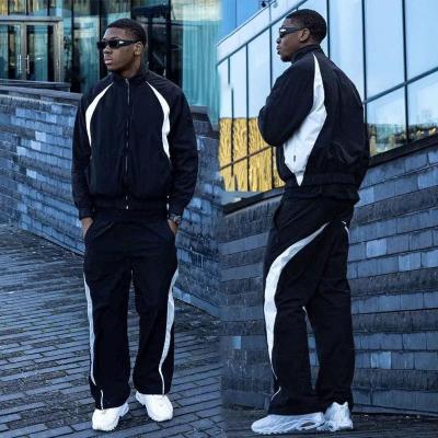 China Customized Logo Oversized Windbreaker Tracksuit Men's Nylon Sweatsuit Antistatic for sale