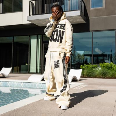 China Custom Rhinestone Stripe Design Tracksuit Flare Stacked Sweat Pants Men Sweatsuits Unisex Sets Hoodies Custom Logo Jogger Set for sale