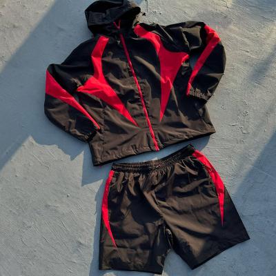 China Custom Nylon Windbreaker Short Set Hoodie and Shorts Tracksuit Suit Plaid Pleated Fabric 2 Piece Zip up Jacket and Shorts Set for sale