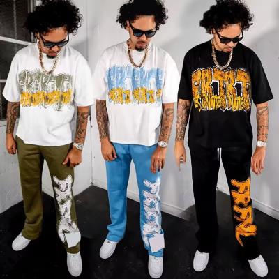 China Screen Print Tshirt Logo Jogger Straight Leg Distressed Embroidery Stacked Flared Sweatpants and T Shirt Men Summer Sets Custom for sale