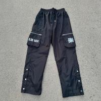 China Custom Nylon Screen Print Outdoor Cargo Pants Windbreaker Lightweight Zipper Pocket Sweatpants Side Hem With Button up Collar for sale