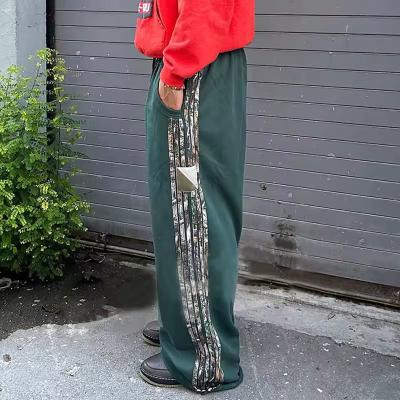 China Custom Logo Nylon Jogger Graphic High Quality Heavyweight Loose Wide Leg Baggy Sweat Pants Flared Stacked Sweatpants for Men for sale