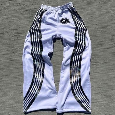 China Custom Windbreaker Side Stripe Embroidery Print Oversized Nylon Jogger Wide Leg Baggy Pants Sweatpants Flare Sweat Pants Men for sale