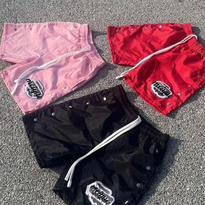 China Custom Windbreaker Button Snap Shorts Embroidery Chenille Nylon Shorts Loose Lightweight Nylon Basketball Gym Shorts for Men for sale