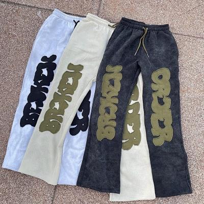 China Acid Wash Distressed Wide Leg Sweatpants Applique Logo Hip Hop Joggers Cargo Pants for sale