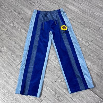 China Loose Fit Men's Sweatpants With Custom Embroidery Patch And Color Blocked Corduroy Fabric for sale