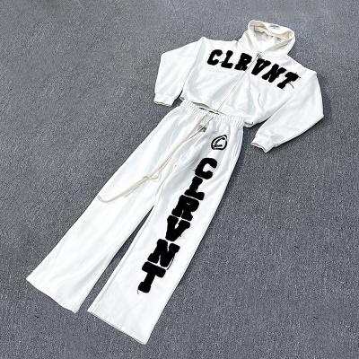 China Men's Custom Tracksuit Set With Vintage Applique Embroidered Hoodie And Joggers for sale