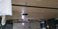 China 14/2mm Office Ceiling Tiles Hall Sound Absorbing Fireproof Grooved Acoustic Wall Panels for sale