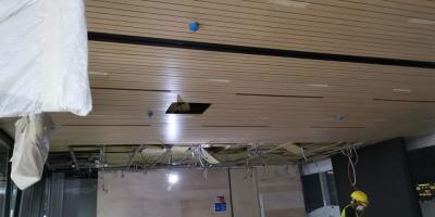 China 14/2mm Office Ceiling Tiles Hall Sound Absorbing Fireproof Grooved Acoustic Wall Panels for sale