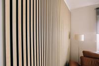 China 28/4mm Hotel Guest Room Grooved Acoustic Wall Panels Sound Absorption Isolation Board for sale