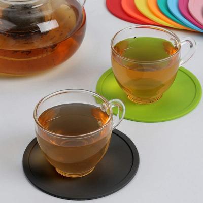 China Eco-Friendly Round Silicone Coasters - Non-Slip Heat Resistant Tableware for Home Use with 230°C Temperature Range for sale