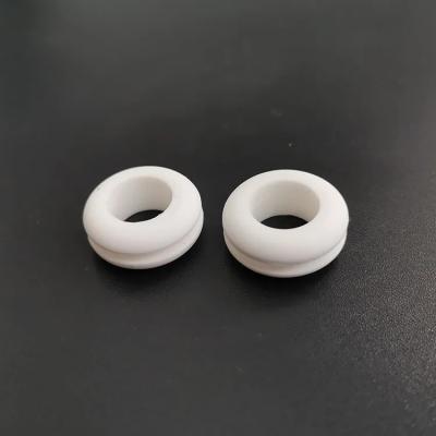 China Double Sided Protective Silicone Rubber Grommet - Heat Resistant up to 327°C with 15-20 MPa Tensile Strength for sale