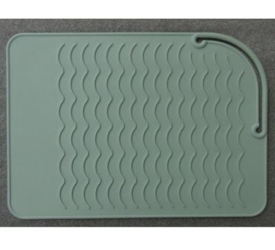 China Industrial Silicone Insulation Mat 40x60cm Anti Slip High Temperature Resistant Countertop Pot Pad for sale