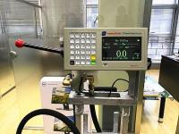 China Anti Cheating Lpg Filling Carousel System 50g Division 180Kg Weighing for sale