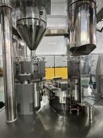 China Rotated Medical Pellet Filling Machine Line Capsule Production Equipment for sale