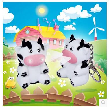 China New creative gift product cartoon animal cow led light keychain keyrings with sound for sale