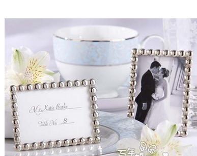 China New creative promotion gift product wedding gift silver pear photo frame for sale