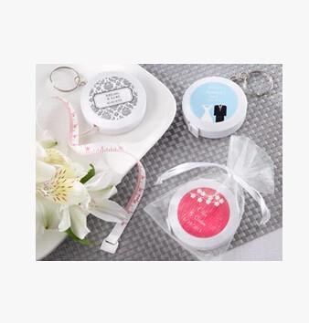 China New creative promotion gift product wedding gift tape keychain keyrings for sale