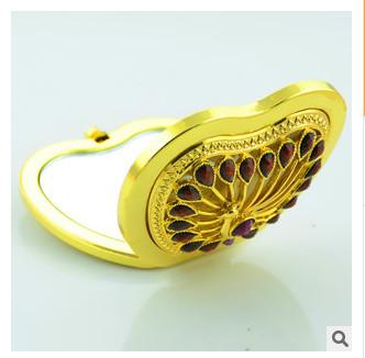 China New creative promotion gift customed diamond logo copper apple luxury pocket makeup mirror for sale