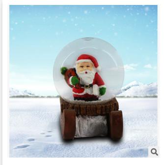 China New creative promotion gift christmas santa clause resin led snow glass ball event supplie for sale