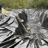 China 1.5mm HDPE Geomembrane Double Smooth Texture Pond Liner Industrial Grade 0.94 Density for sale