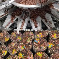 China Automatic Mixed Chocolate Packaging Filling Machine With Capping And Labeling Line Nut Snack Packaging Machine for sale