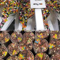 China Automatic Mixed Chocolate Packaging Filling Machine With Capping And Labeling Line Nut Snack Packaging Machine for sale