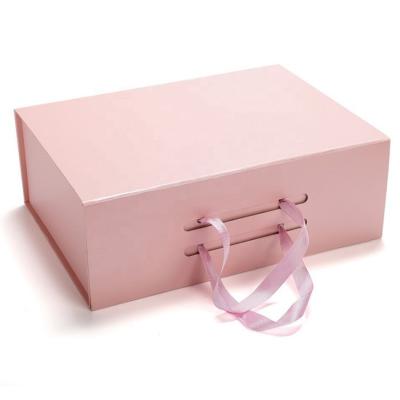 China Magnetic Folding Box With Ribbons Luxury Clothes Gift Packaging Support for sale