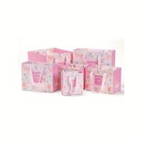 China Mini Paper Gift Bags With Handles Nylon Matte Finishing Custom Company Logo for sale