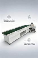China STCM-HM Industrial Curtain Making Machine with 4000mm Conveyor, Adjustable Hemming Size and Back Tension Pulling for sale
