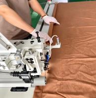 China STCM-HM Industrial Curtain Making Machine with 4000mm Conveyor, Adjustable Hemming Size and Back Tension Pulling for sale