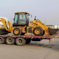 China 2500kg Towable Backhoe Loader Machine With 4 In 1 Bucket for sale
