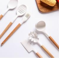China Odorproof Silicone Kitchen Utensil Sets 14pcs Scratchfree Dentless With Holder for sale