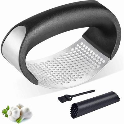 China ODM Available Arc Shaped Garlic Press Sanding Surface Ergonomic for sale