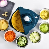 China Round Vegetable Slicer 12 in 1 Set with Hand Protector 1.2L Capacity Stainless Steel for sale