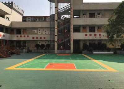 China PP Interlocking Kindergarten Flooring 303.8x303.8x14.7mm with 60% Shock Absorption and SGS Certification for sale