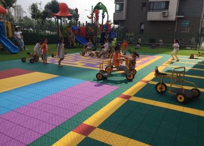 China EMG-2516 Modular Sports Flooring with 512 Cushions per m² - Shock Absorbent PP Kindergarten Flooring for sale