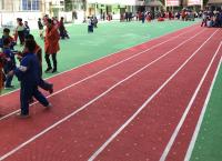 China Anti-Skid PP Running Track Flooring 303.8×303.8×14.7mm with 60% Shock Absorption and Integrated Drainage System for sale