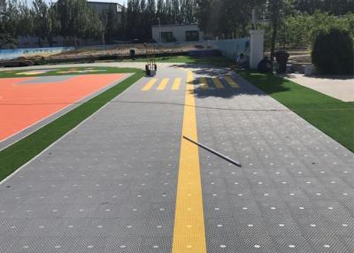 China Outdoor Removable PP Sports Flooring 300x300x15.8mm with 54% Shock Absorption and Anti-Microbial Surface for sale