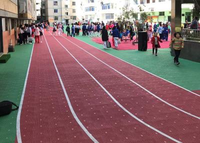 China SMG-3015 Synthetic Portable Athletic Track Flooring 303.8×303.8×14.7mm with 57% Shock Absorption and -15℃ to 70℃ Temperature Resistance for sale