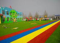 China PE + PP Artificial Grass Kindergarten Flooring - 18-45mm Height, 8100 Dtex Flat Yarn - Light Green for sale