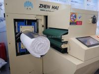 China Pillow Comforter Cushion Rolling Packing Machine 3900mmx650mmx970mm for sale