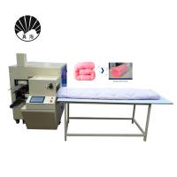 China Automatic Rolling Coiling Quilt Rolling Wrapping Machine for sale